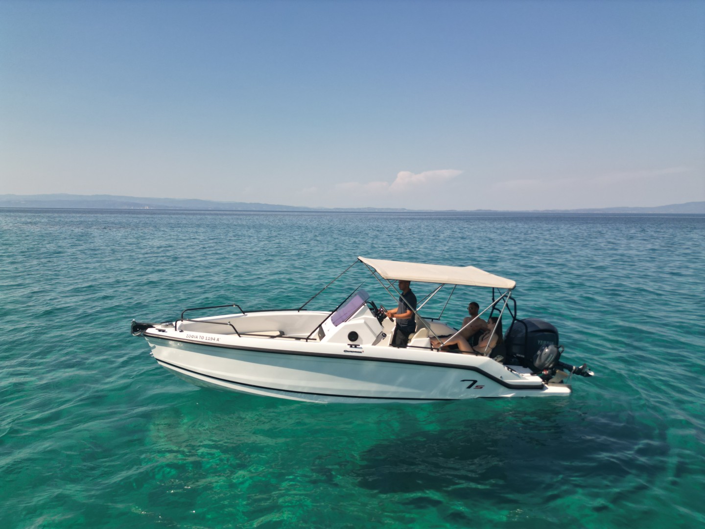 Rent a Motorboat Compass 7s in Vourvourou | SamBoat